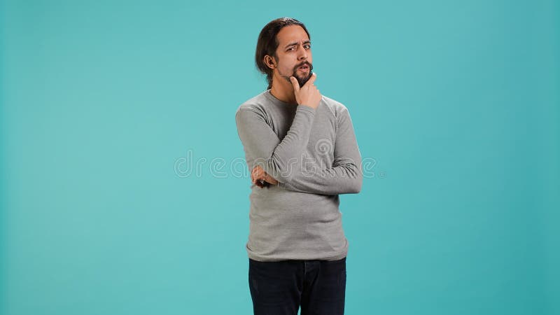 Unsure Person Doing Stroking Chin Gesture, Thinking Stock Image - Image ...