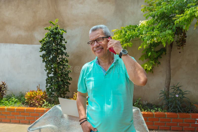 An Unsuspecting Old Man Using a Smartphone Stock Image - Image of ...