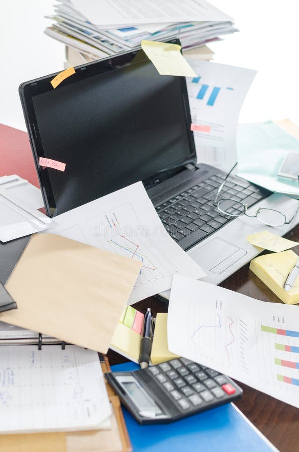 Untidy and cluttered desk stock image. Image of clutter - 56856759