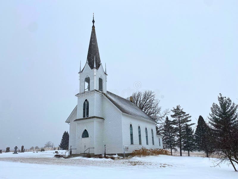 A Very Detailed and Ornate Old Country Church in a Snowstorm Stock ...