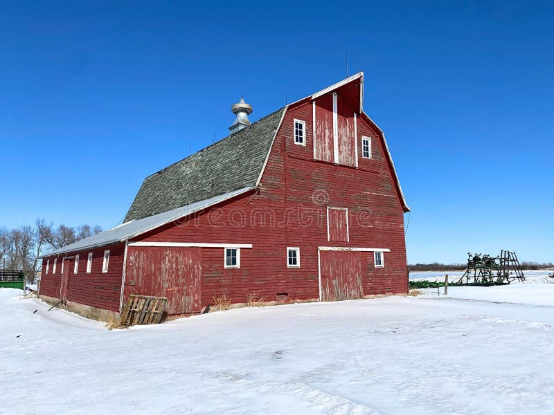A Quintessential Red Barn in the Winter Snow Stock Photo - Image of ...