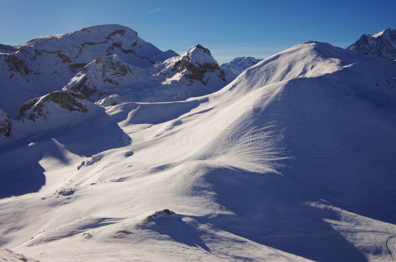 Untouched snow fields stock photo. Image of cold, mountain - 76972126