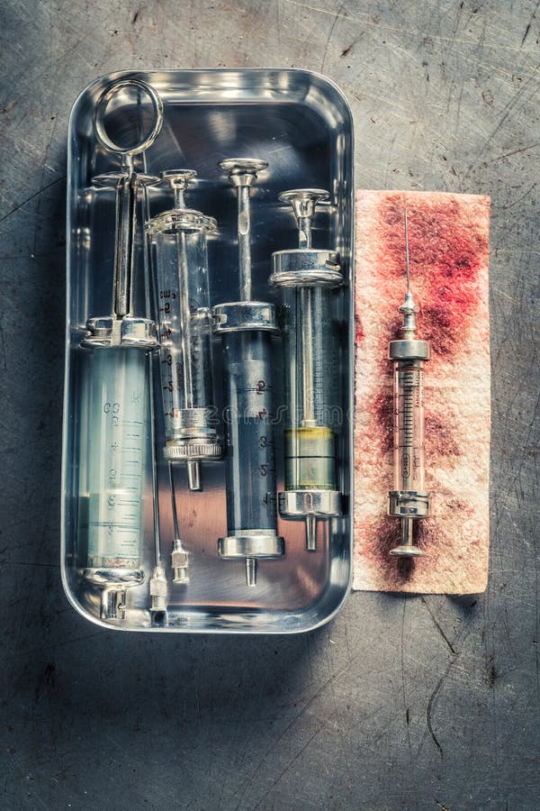 Unusable and Retro Needle and Syringes in Steel Container Stock Photo ...