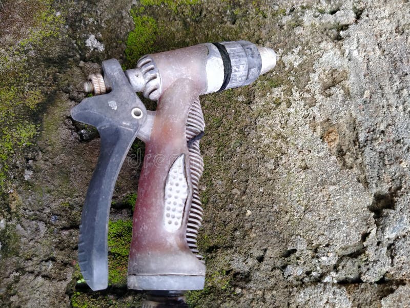 Unused Air Compressor Handle Against a Wall Stock Photo - Image of ...