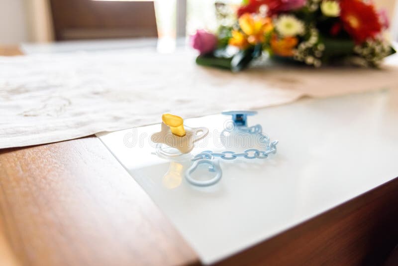 Unused Baby Pacifier on a Table Stock Image - Image of clothing, birth ...