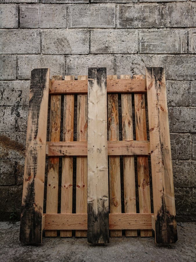 Unused wooden pallets stock photo. Image of building - 264184134
