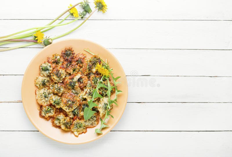 Fried dandelion flowers stock photo. Image of bloom - 188607830