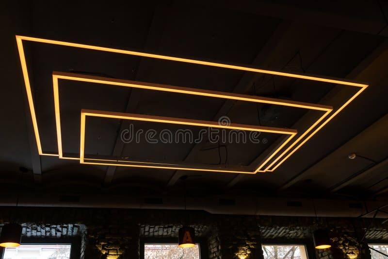 Unusual Rectangular Design Lamps on the Ceiling in an Expensive ...