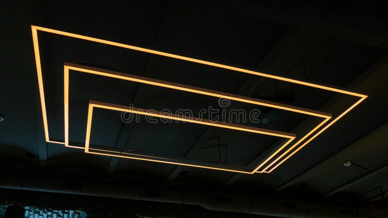 Unusual Rectangular Design Lamps on the Ceiling in an Expensive ...