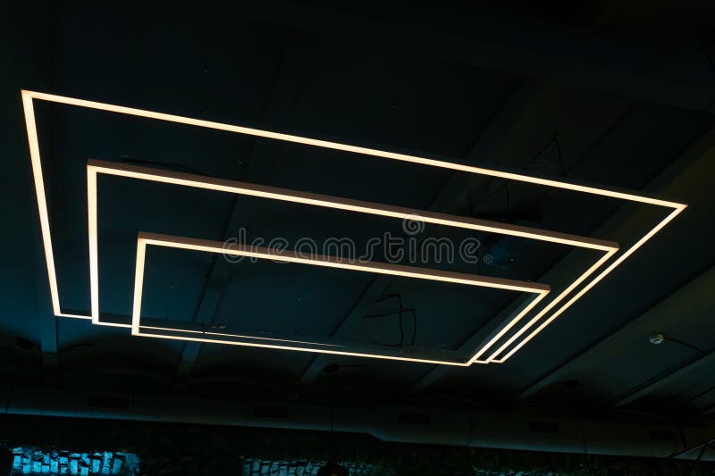 Unusual Rectangular Design Lamps on the Ceiling in an Expensive ...
