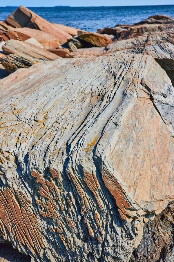 Unusual Rock Formations on Maine Coast with Sheets of Layers and Orange ...