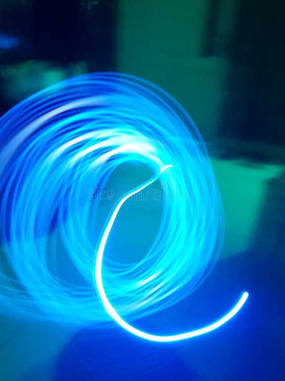 An Unusual Rotating Blue Light Glow in the Darkness? Stock Photo ...