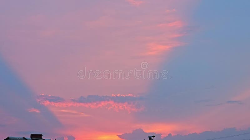 Unusual Sunset. Pink Conical Optical Effect from the Rays of the ...