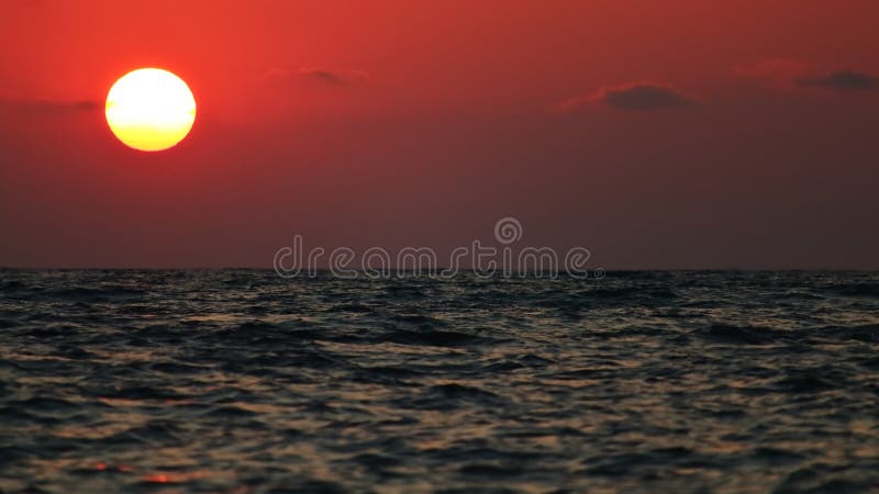 Unusual Sunset of the Red Sun Over Sea Stock Image - Image of ocean ...