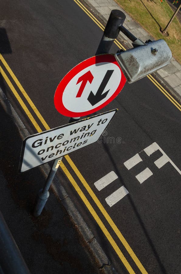 Give Way To Oncoming Vehicles Stock Image - Image of street, island ... Give Way To Oncoming Vehicles Stock Image - Image of street, island ...