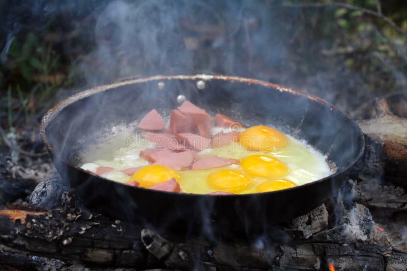 An Unusual Way of Cooking Eggs on Fire Stock Photo - Image of nature ...