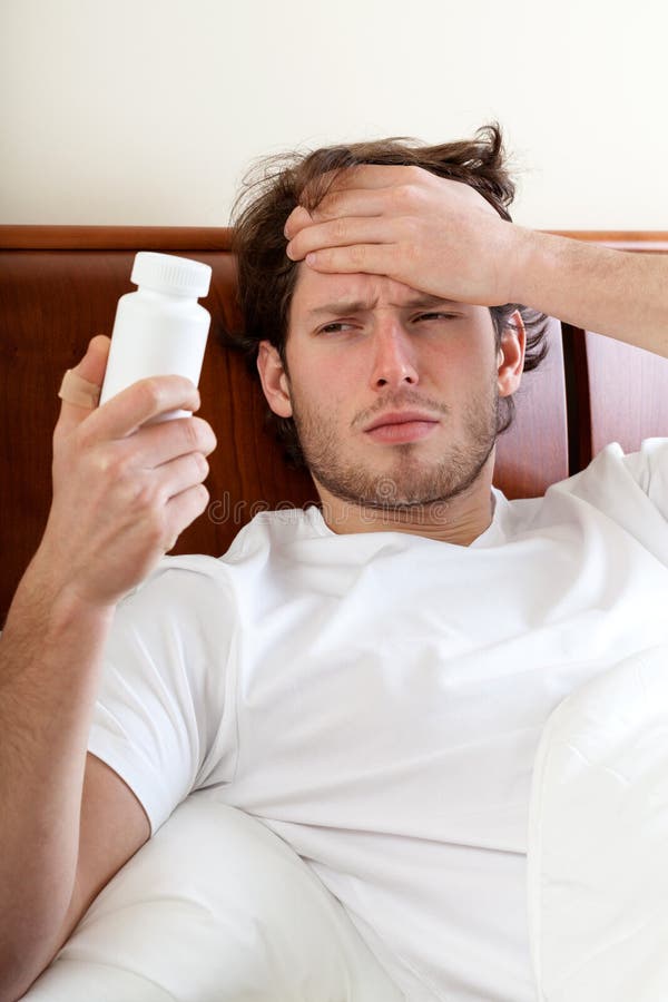 Unwell man with headache stock image. Image of person - 38749107