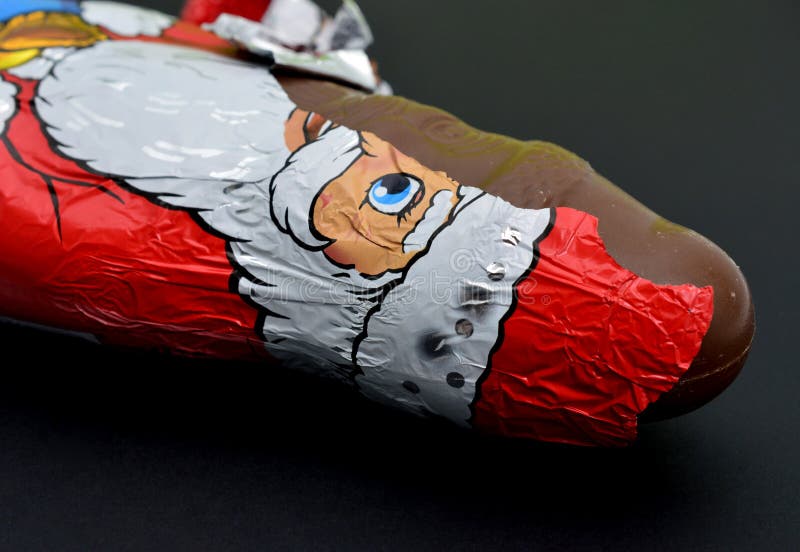 Unwrapped Chocolate Santa Claus Stock Photo - Image of celebrate, paper ...