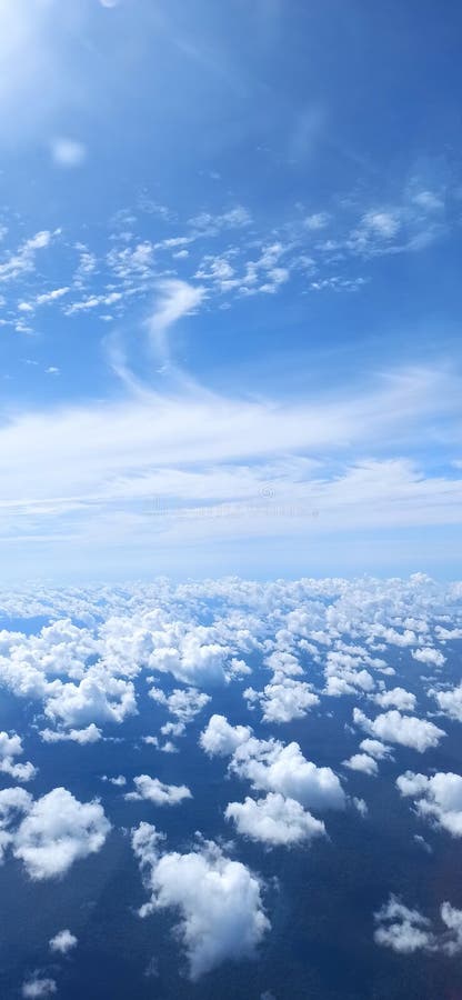 From up above stock image. Image of blue, plane, clouds - 266591069