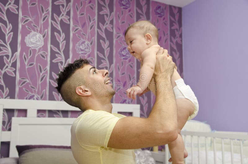 Father lifting baby stock photo. Image of girl, parenting - 43672192