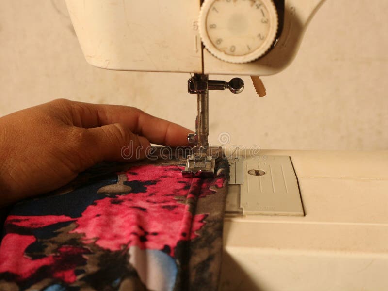 Someone is Sewing Cloth with a Sewing Machine Stock Photo - Image of ...
