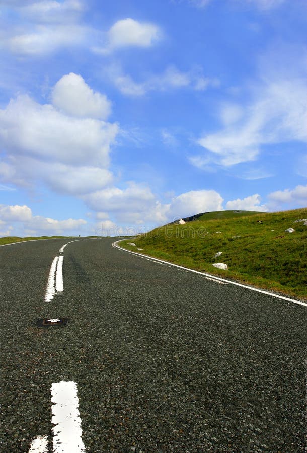 The Road Up the Hill stock photo. Image of clouds, empty - 147430