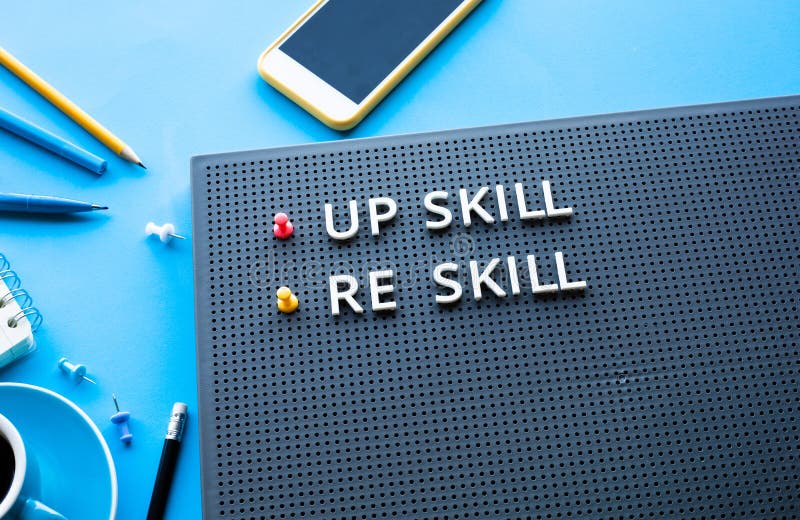Up Skill and Re Skill Text on Desk Table. Performance or Development ...