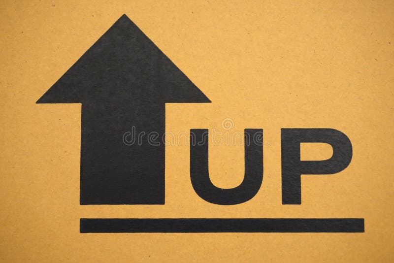 Up symbol on carton box stock image. Image of clip, cardboard - 47714955