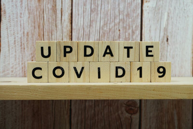 Update Covid-19 Alphabet Letter on Wooden Background Stock Image ...