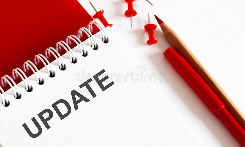 BUSINESS UPDATE Text on the Sticker through Magnifier. View from Above ...