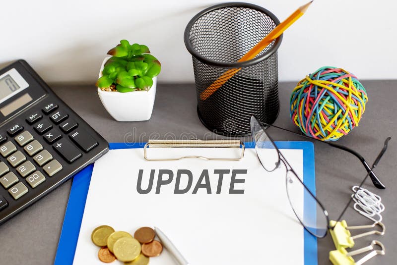 UPDATE Written on the Paper with Office Tools Stock Image - Image of ...