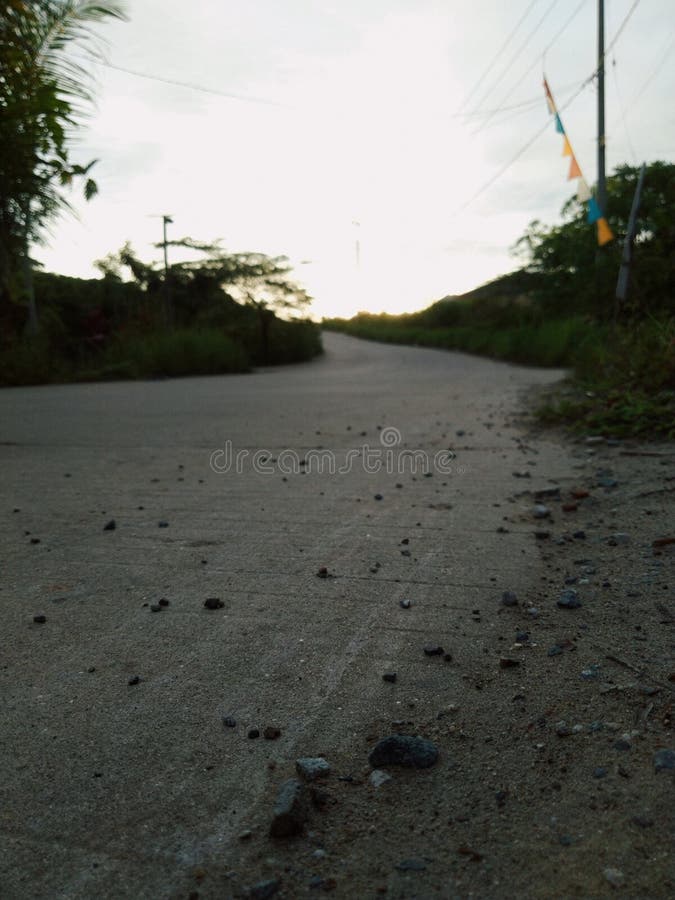 Uphill road 3 stock photo. Image of leaf, sidewalk, morning - 268361618