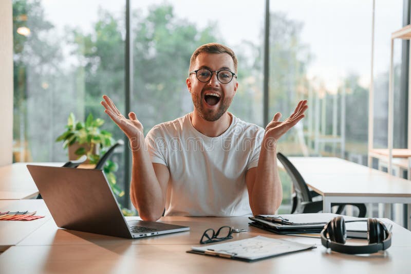 Uplifting Mood. Man in Formal Clothes is Working in the Modern Office ...