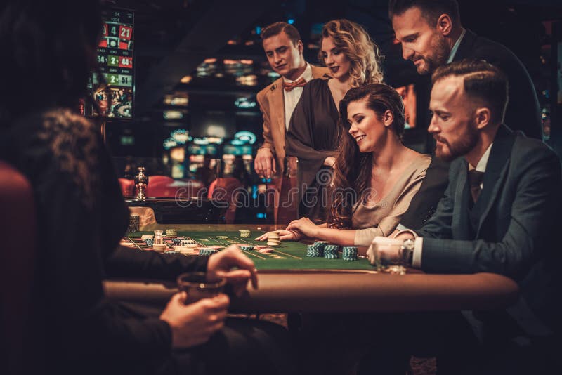 Upper Class Friends Gambling in a Casino Stock Photo - Image of glamour ...