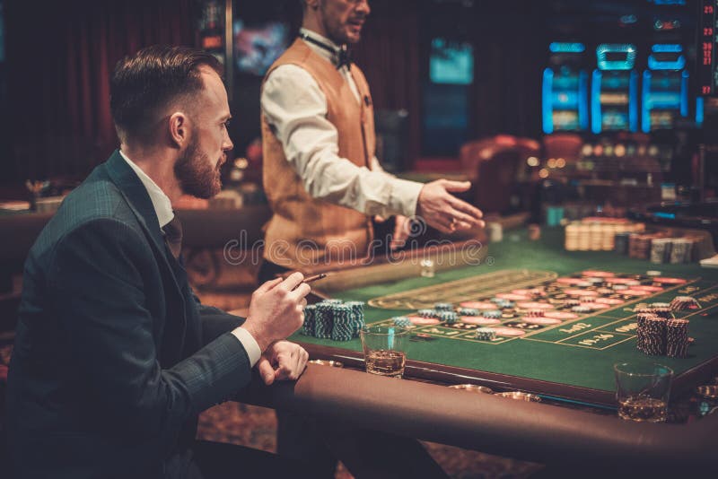 Upper Class Man Gambling in a Casino Stock Photo - Image of people ...