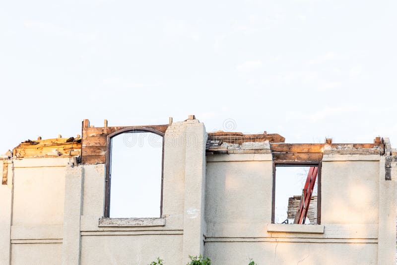 Upper Half Image of Stucco Building with Roof Gone. Stock Photo - Image ...