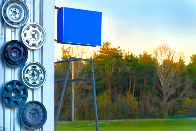 Car Station. Metal Car Rims Hanging on the Wall Stock Photo - Image of ...