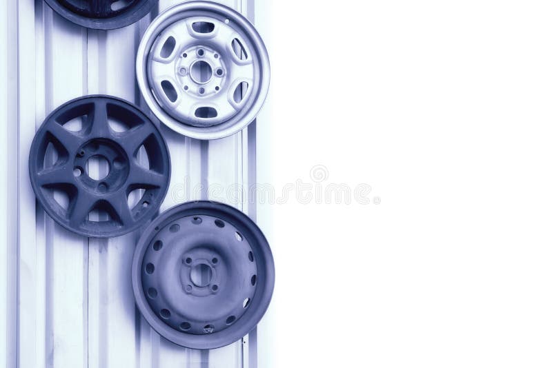 Three Metal Car Rims Hanging on the Wall with Space for Text Stock ...