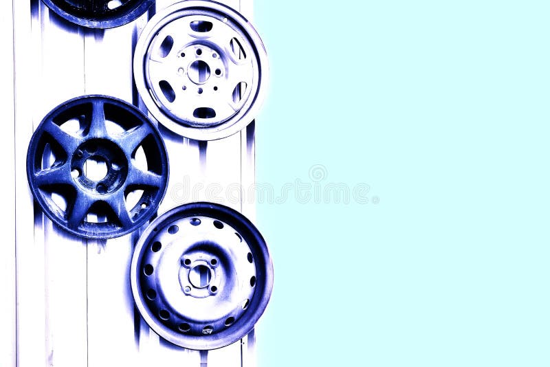 Three Metal Car Rims Hanging on the Wall with Space for Text Stock ...