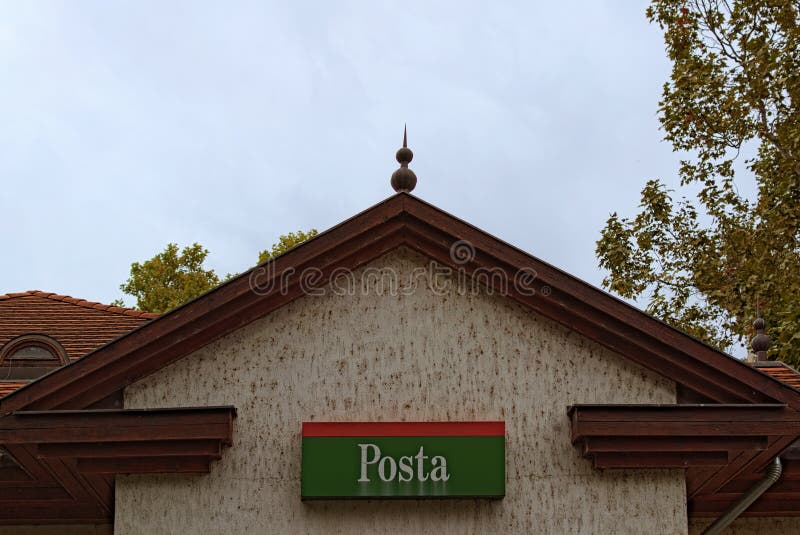 Upper Part of the Facade of the Post Office with a Sign POSTA Eng. Post ...