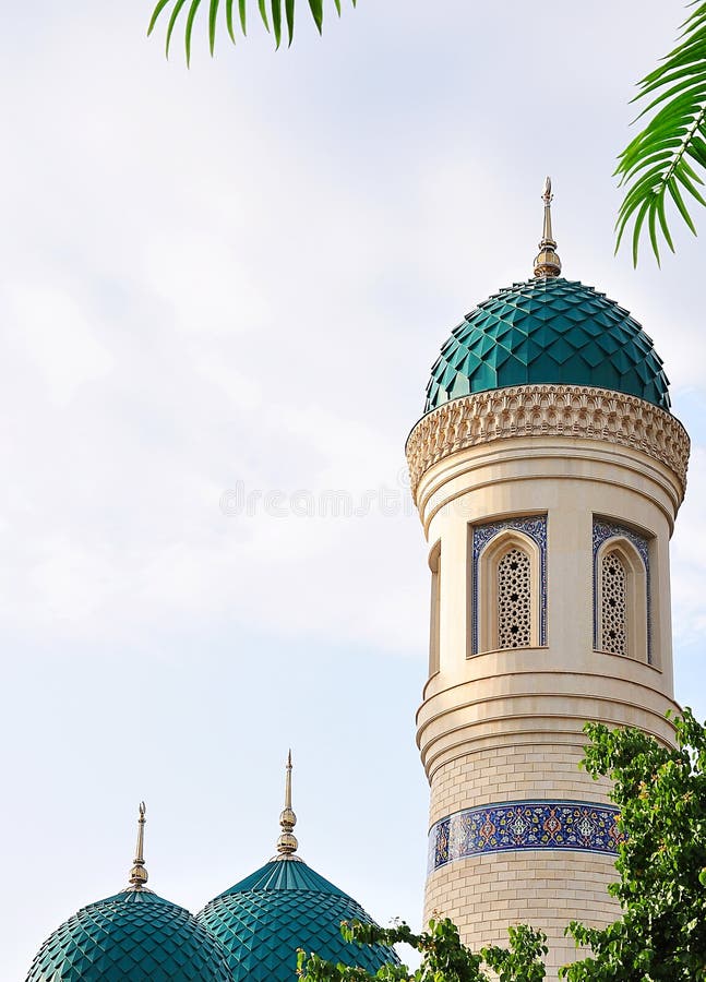 The Upper Part of the Mosque with Beautiful Green Domes. Stock Image ...