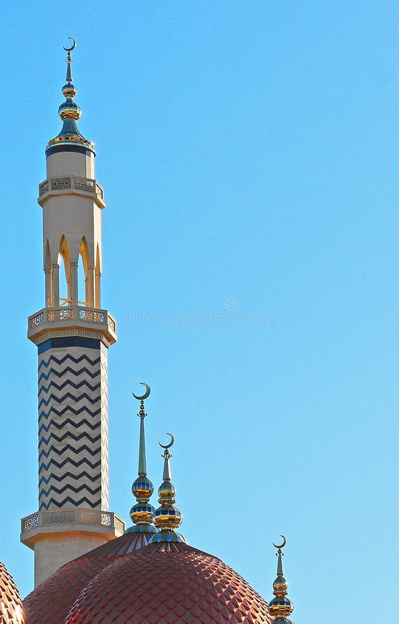 The Upper Part of the Mosque with Beautiful Red Domes and Minaret ...