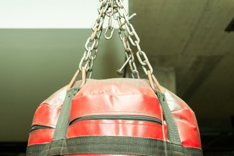 Upper Part of Red Punching Boxing Bag with Chains Closeup. Stock Photo ...