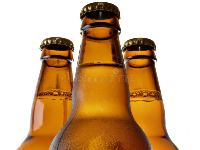 Upper Part of Three Beer Bottles Stock Photo - Image of draft, amber ...