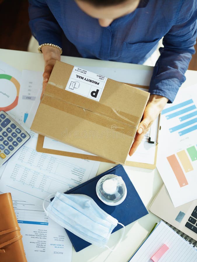 Upper View of Business Woman with Parcel at Table Stock Photo - Image ...