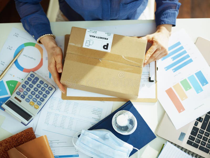 Upper View of Business Woman with Parcel at Table Stock Image - Image ...
