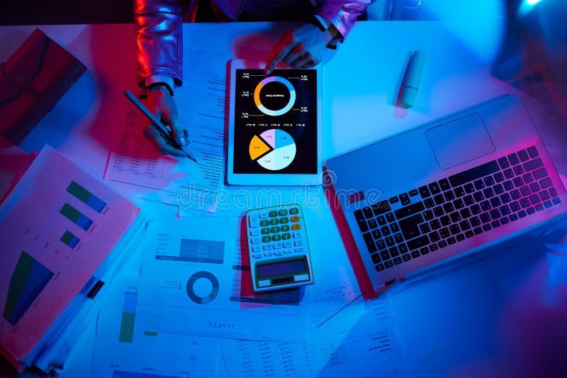 Upper View of Modern Female with Calculator Working with Charts Stock ...