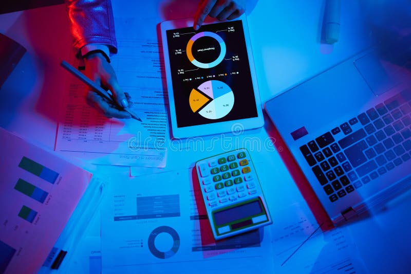 Upper View of Modern Woman with Calculator Working with Graphs Stock ...