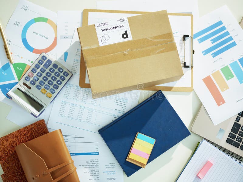 Upper View of Parcel on Desk with Documents at Table Stock Image ...