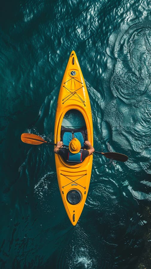 Upper View of a Person Boating in a Yellow Kayak on Lake Stock ...